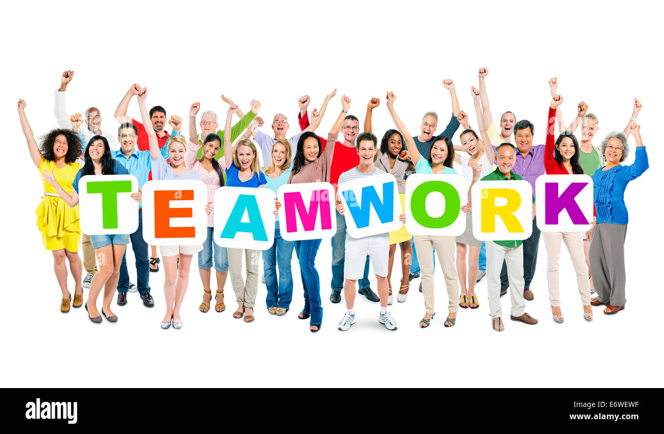 Group of multiethnic casual people holding placards the word "TEAMWORK ...