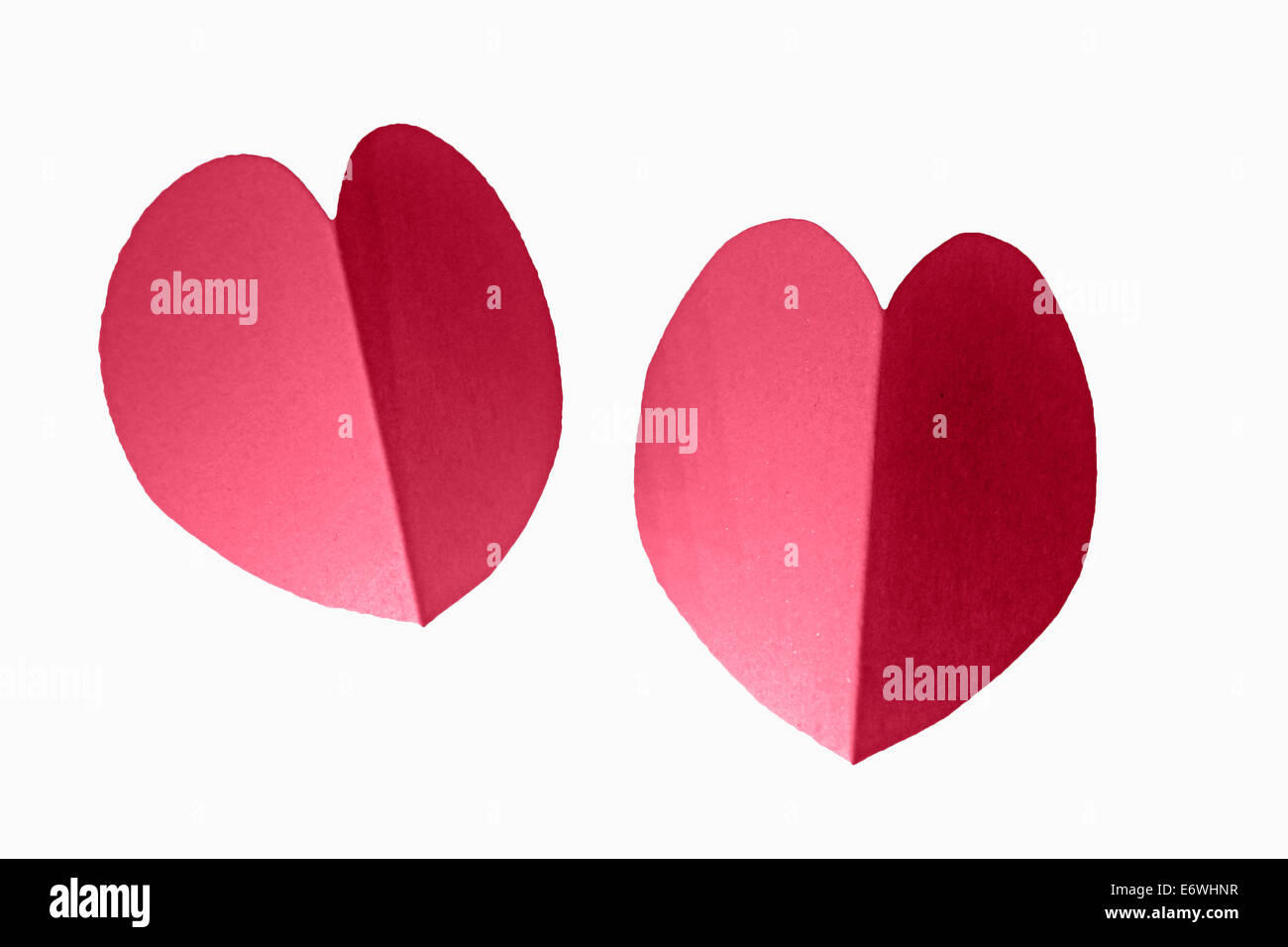 Pink paper hearts background Cut Out Stock Images & Pictures - Alamy