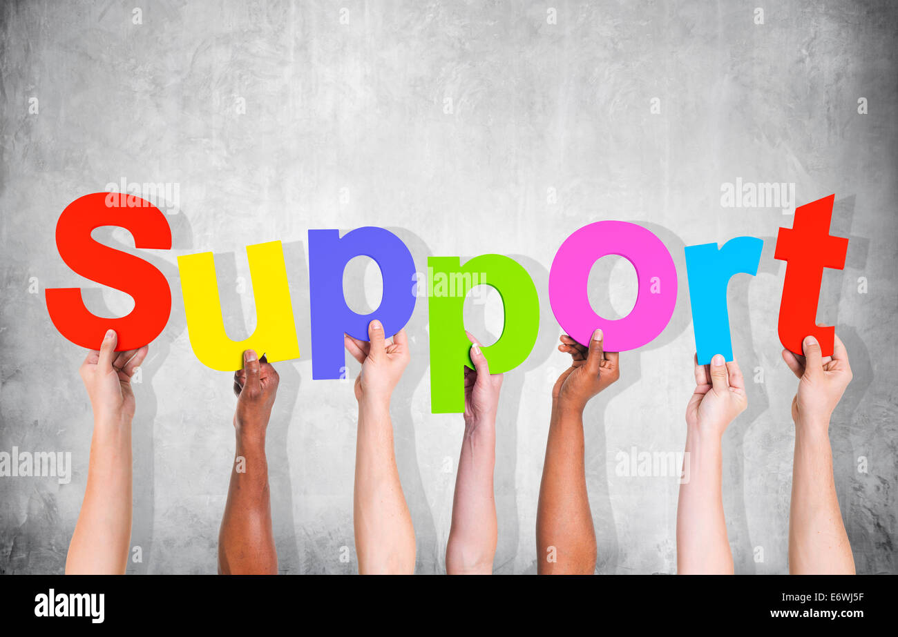 Group of hands holding letters forming the word support Stock Photo - Alamy