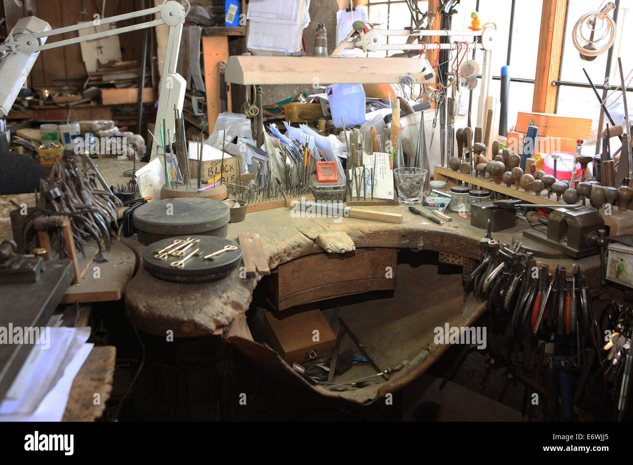 William Hart a Gold & Silversmith working in his Arts and Craft ...