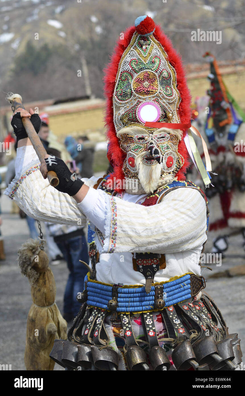 Bulgarians masked a "Kukeri" play their ritual dance in the village of ...