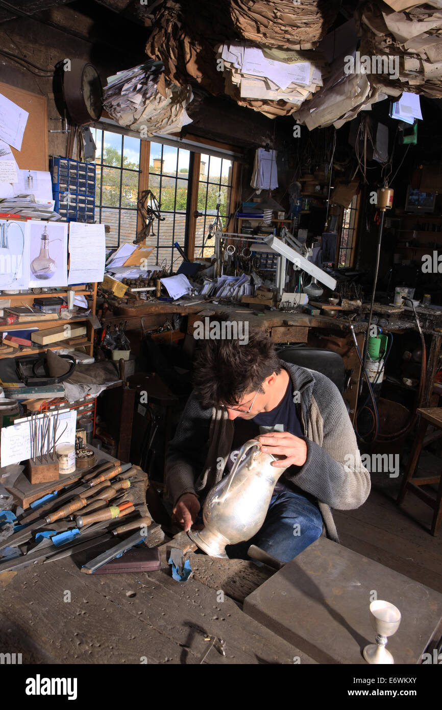 William Hart a Gold & Silversmith working in his Arts and Craft ...