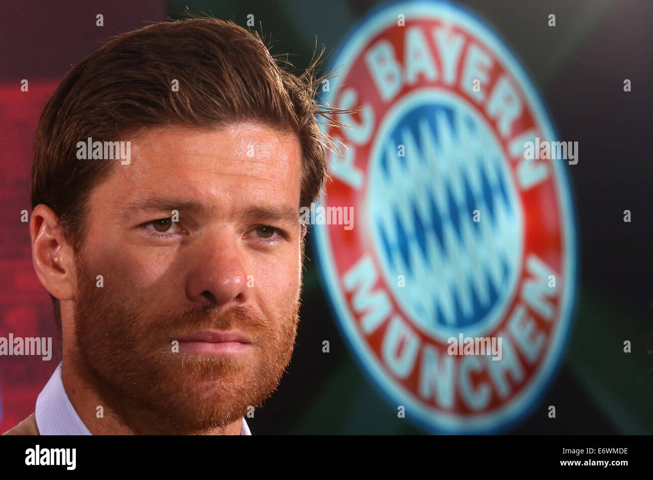 New signing Xabi Alonso of FC Bayern Munich looks on during a press ...