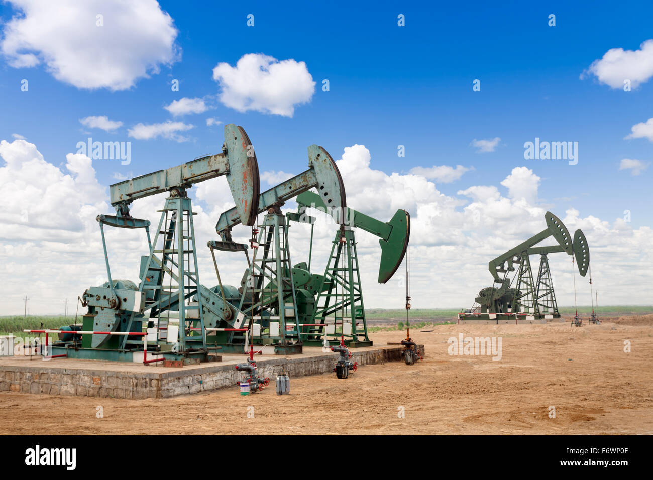 a row of oil pumps Stock Photo - Alamy