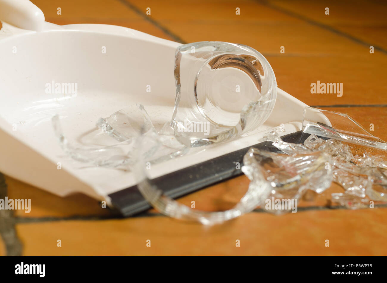 remnants pile of broken glass on floor after accident and glass slipped ...