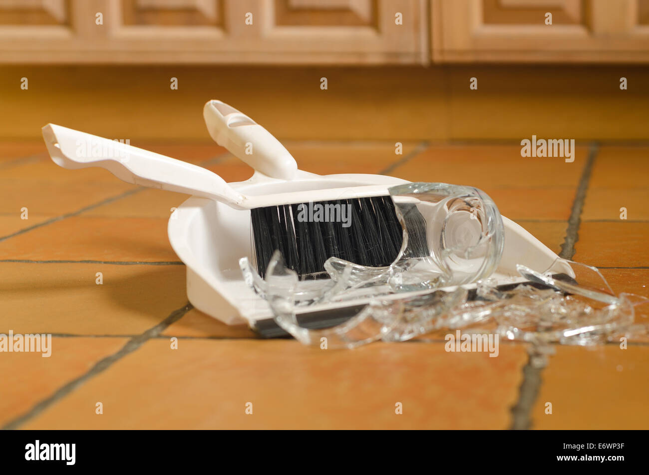 remnants pile of broken glass on floor after accident and glass slipped ...