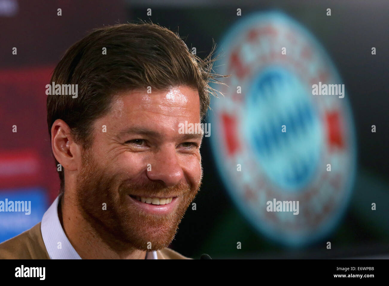 New signing Xabi Alonso of FC Bayern Munich looks on during a press ...