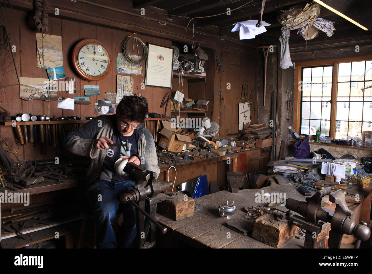William Hart a Gold & Silversmith working in his Arts and Craft ...