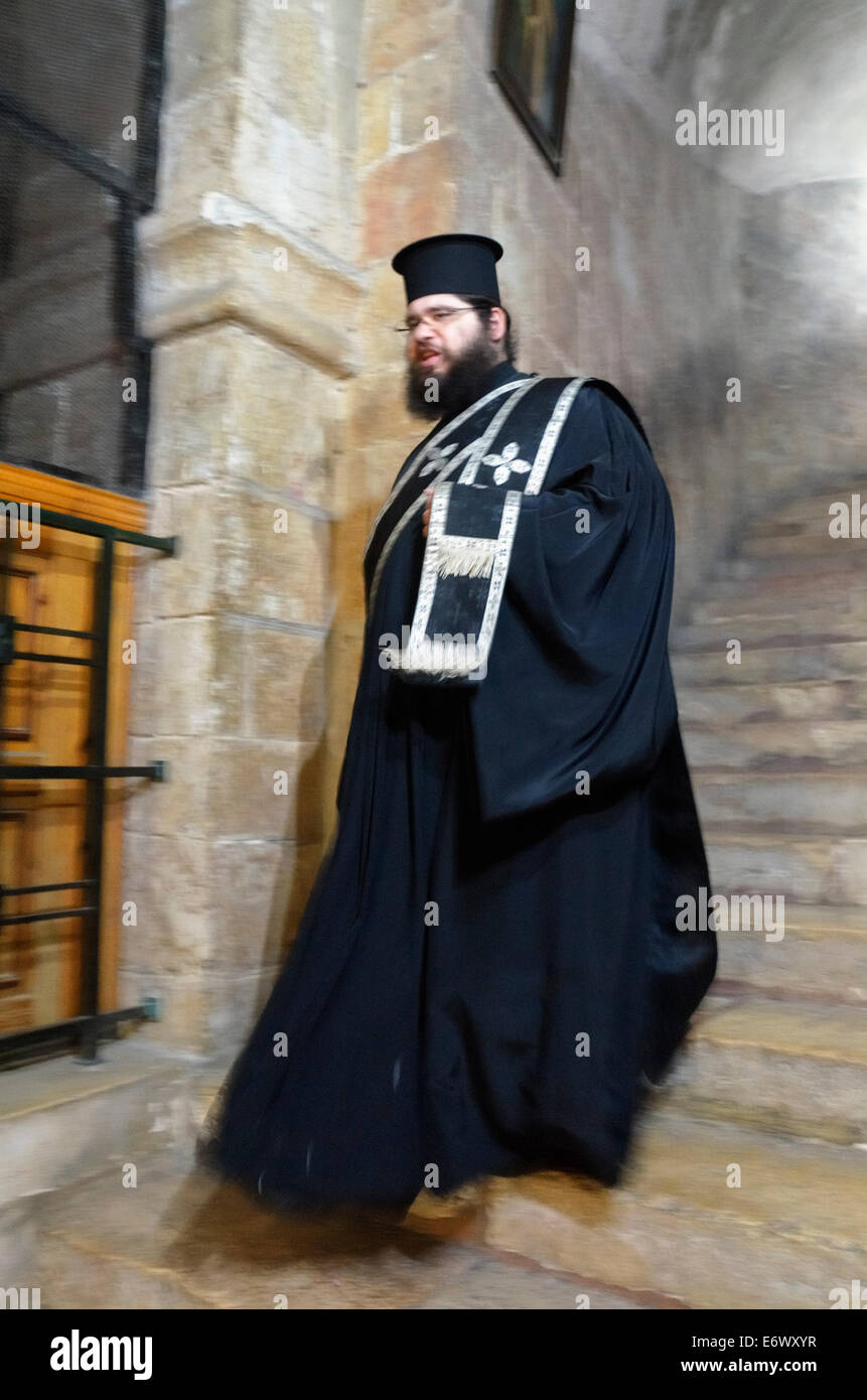 Portrait of priest in the Church of Holy Sepulchre in Old Town of ...