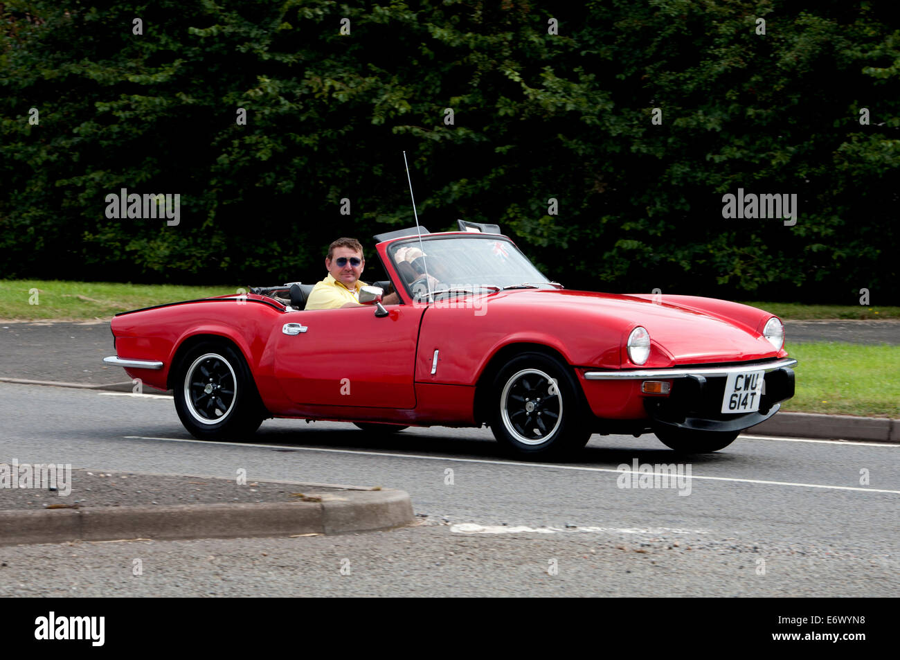 Triumph Spitfire car on the Fosse Way road, Warwickshire, UK Stock ...