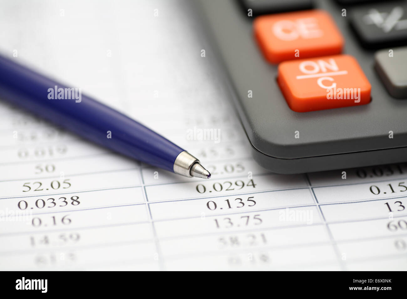 Financial statements. Calculator, ballpoint pen on financial statements ...