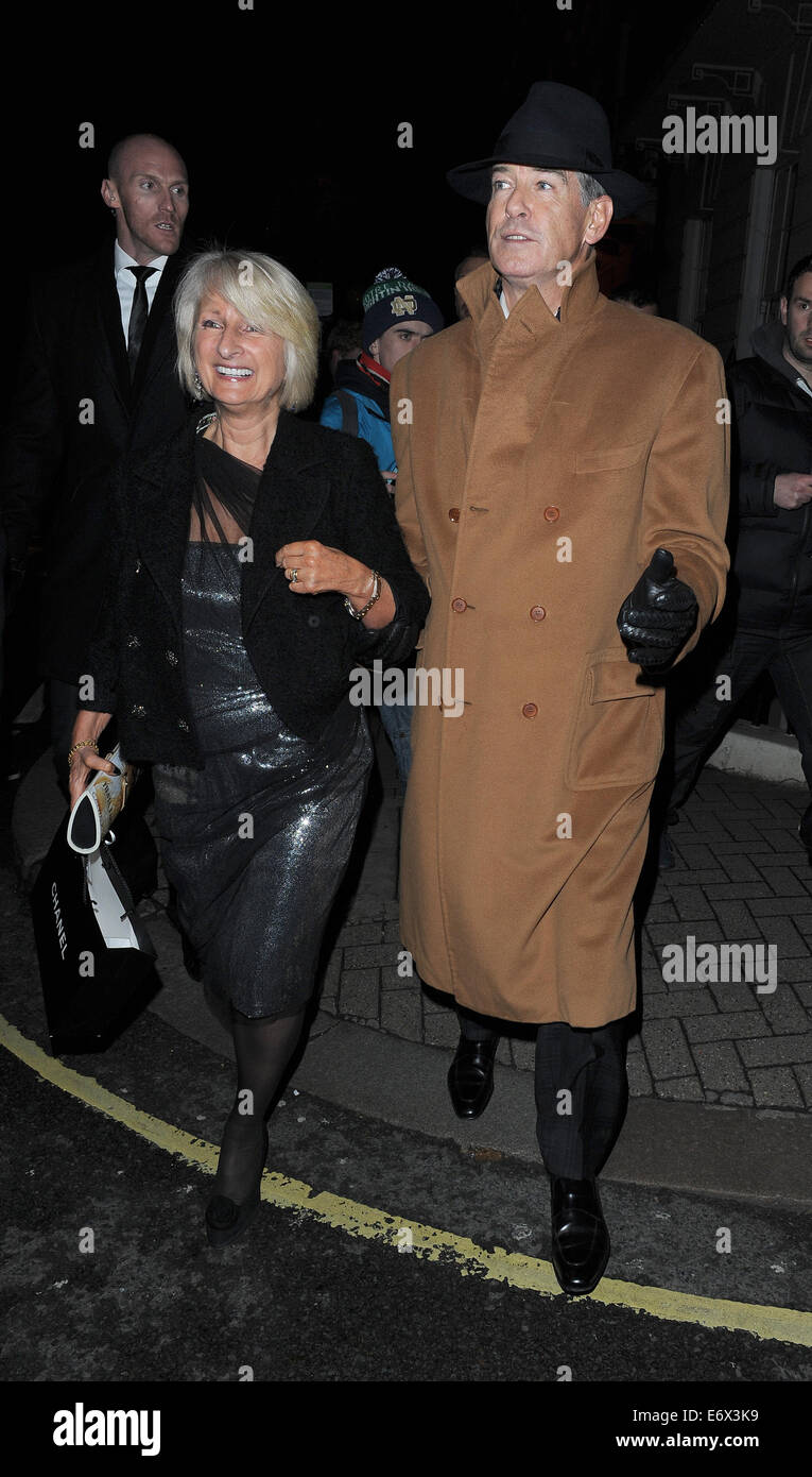 Pierce Brosnan walking in Mayfair with a female companion Featuring ...