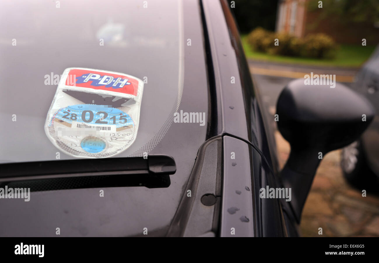 Motoring car and vehicle paper tax disc which the government want to ...