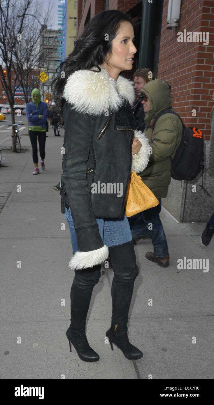 Padma Lakshmi in thigh length black boots and a robot motif top ...