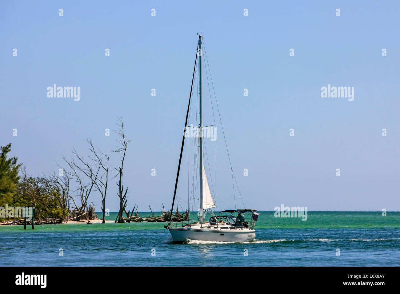 A sailboat enters Sarasota Bay from the Gulf of Mexico FL Stock Photo ...