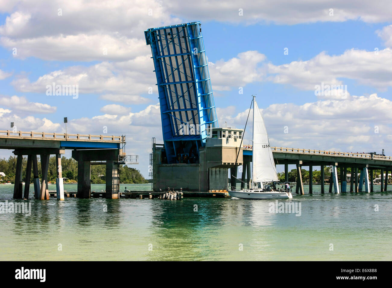 A sailboat passes through the open drawbridge on US789 Anna Maria ...