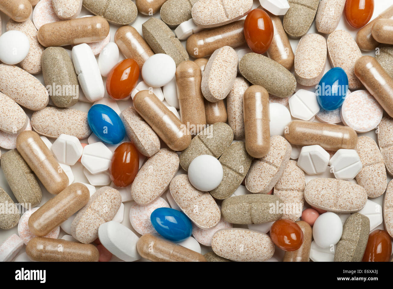 variety of colorfull pills and tablets on white background Stock Photo ...