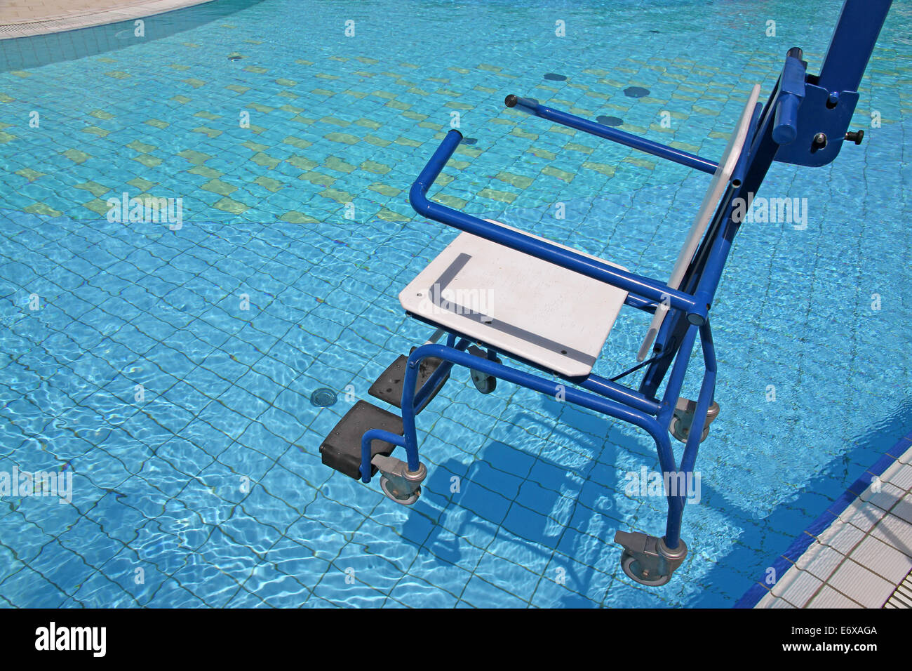 wheelchair for the disabled for use in swimming pool Stock Photo - Alamy