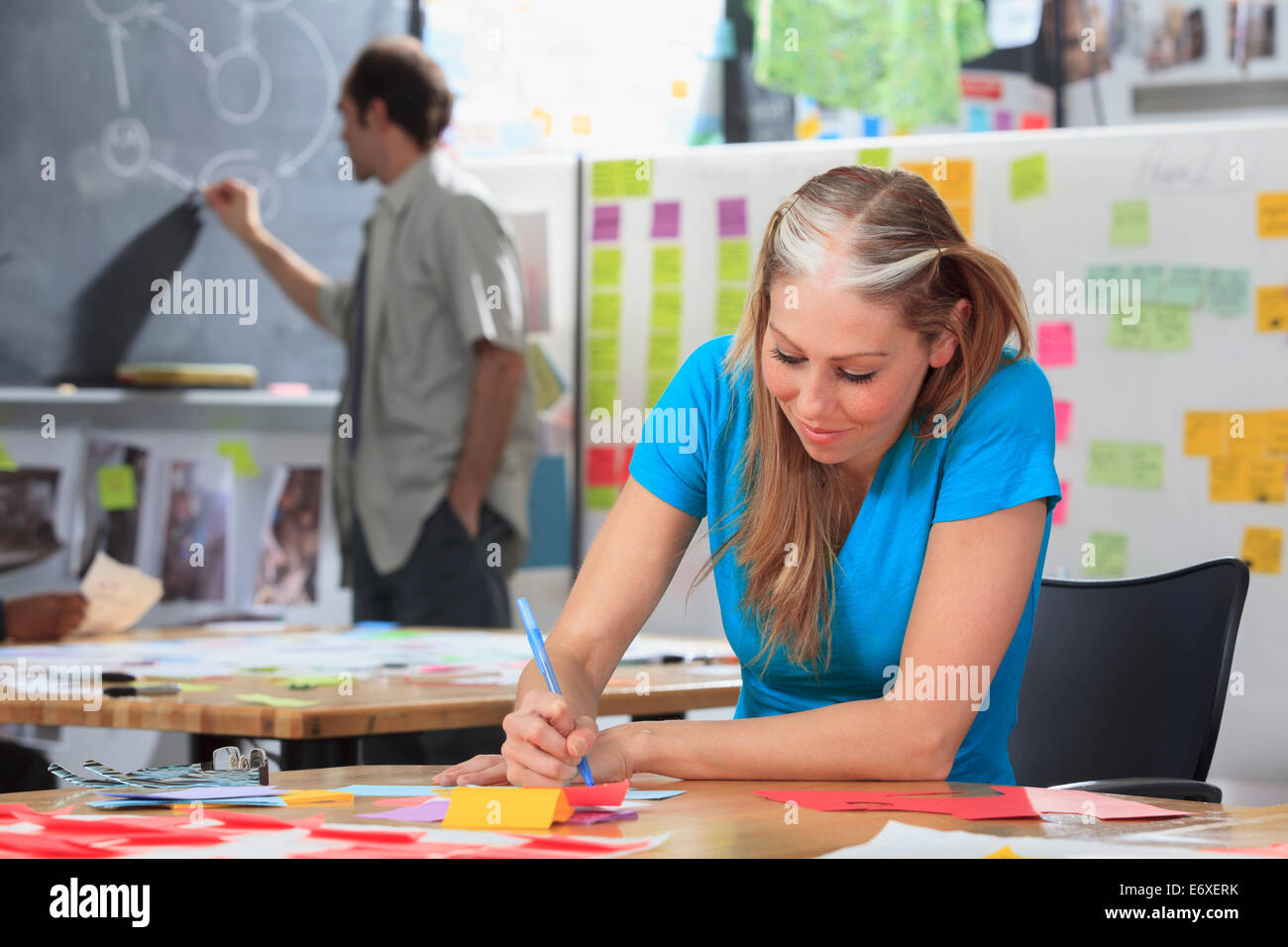 Engineering instructor demonstrating project bubble diagram to students ...