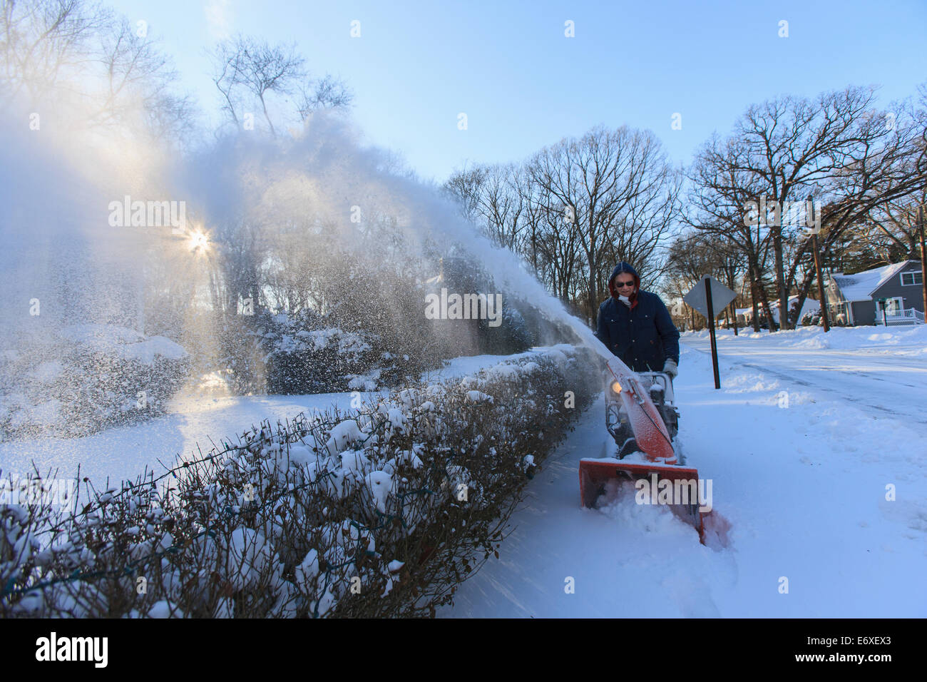 Man using snow blower hi-res stock photography and images - Alamy