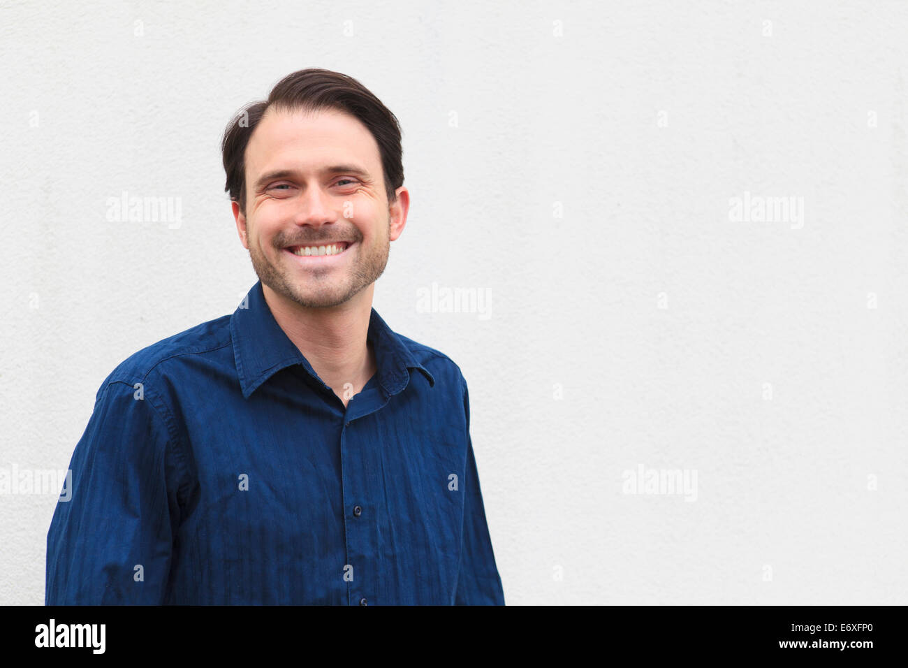 Portrait of a communications engineer smiling Stock Photo - Alamy