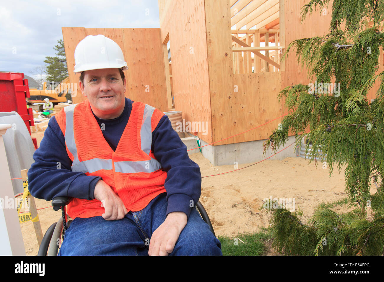 Construction engineer with spinal cord injury at new construction site ...