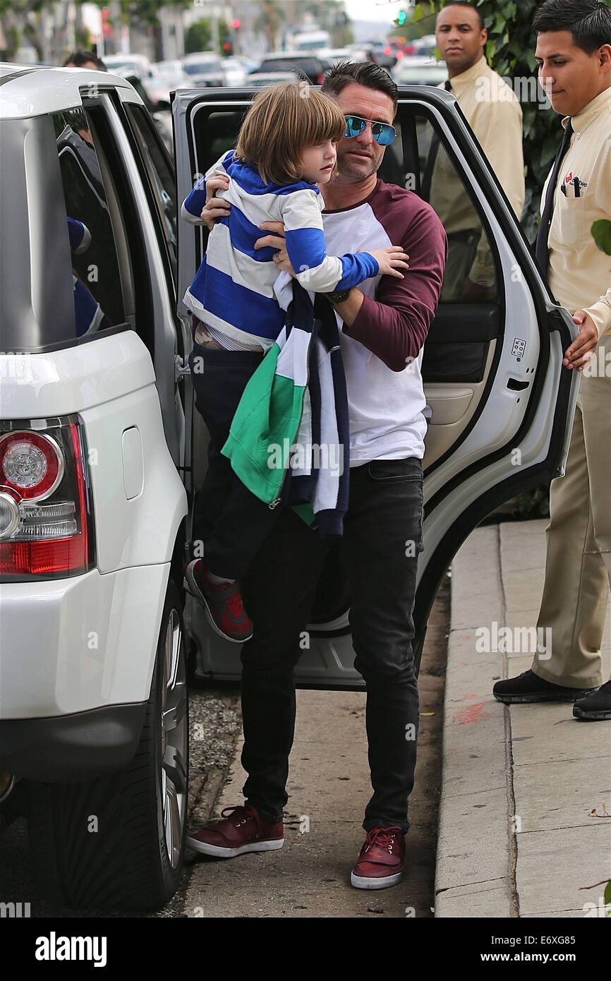 Robbie Keane and Claudine Palmer with their son, Robert Keane Jr, visit ...