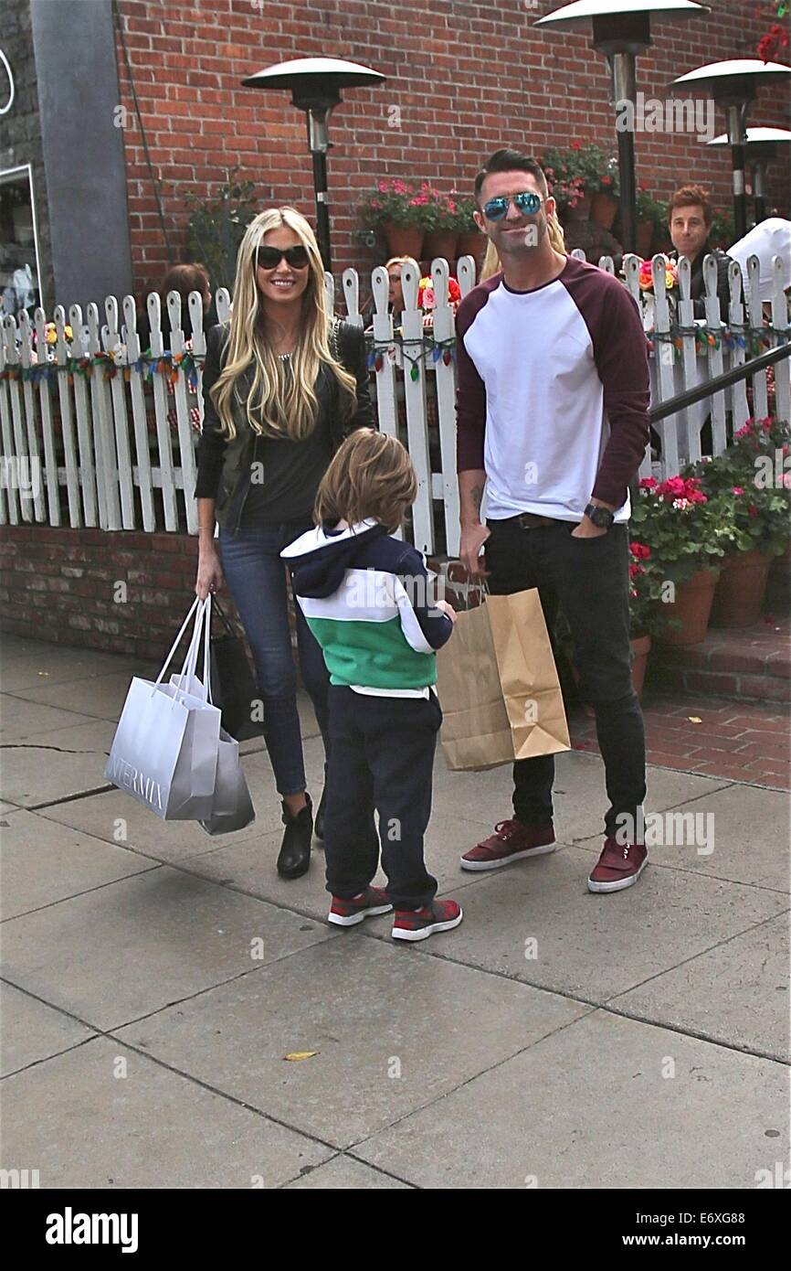Robbie Keane and Claudine Palmer with their son, Robert Keane Jr, visit ...