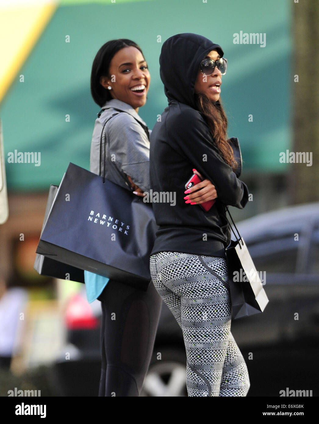 Kelly Rowland shows off her perfect smile after a shopping day out with ...