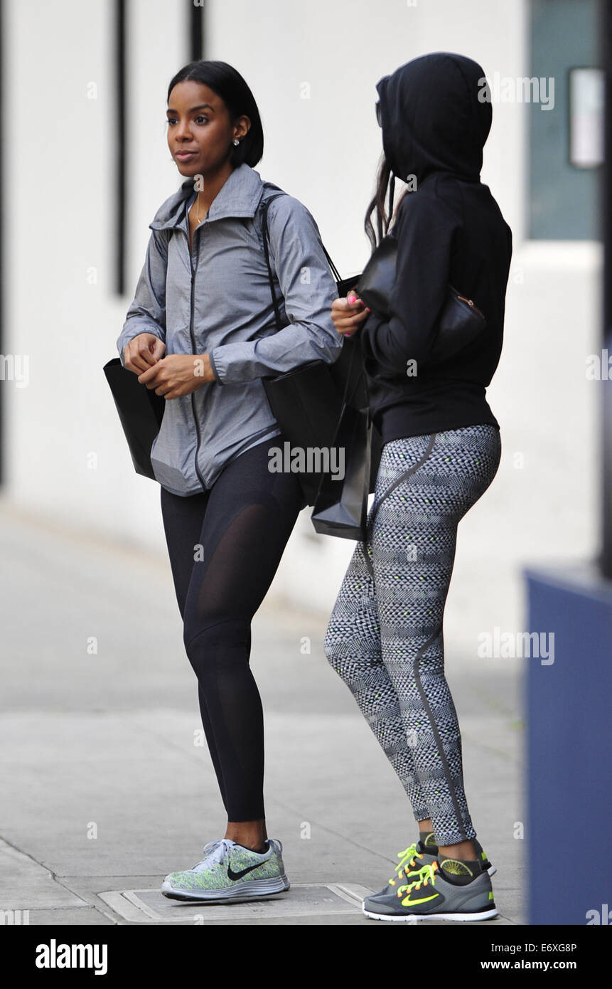 Kelly Rowland shows off her perfect smile after a shopping day out with ...