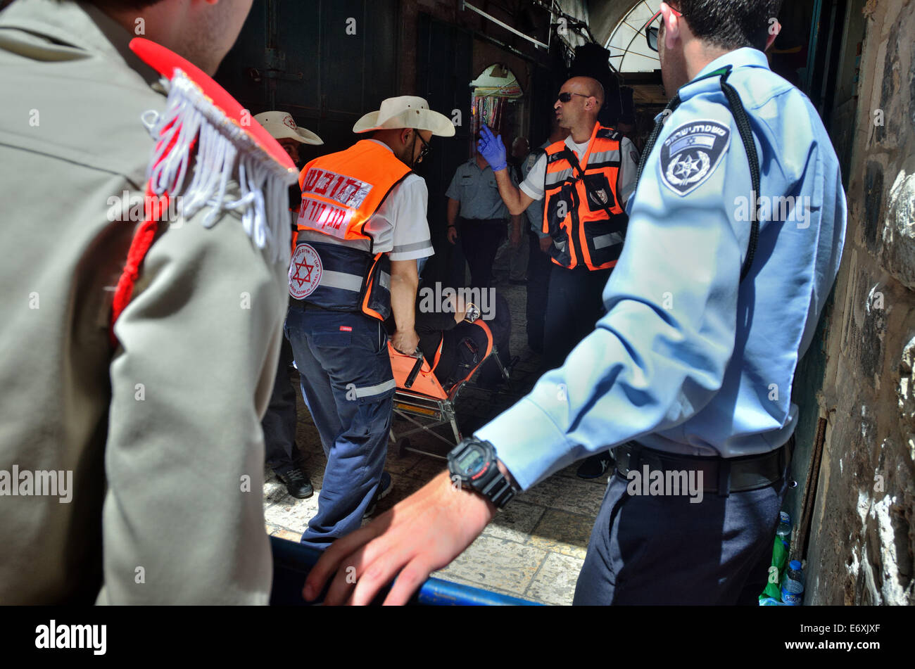 Police provides first aid to their counterpart, who broke his arm in ...