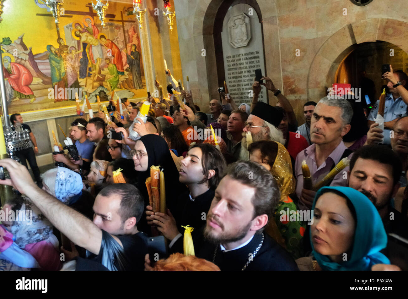 People celebrating Great Saturday inside the Church of the Holy ...