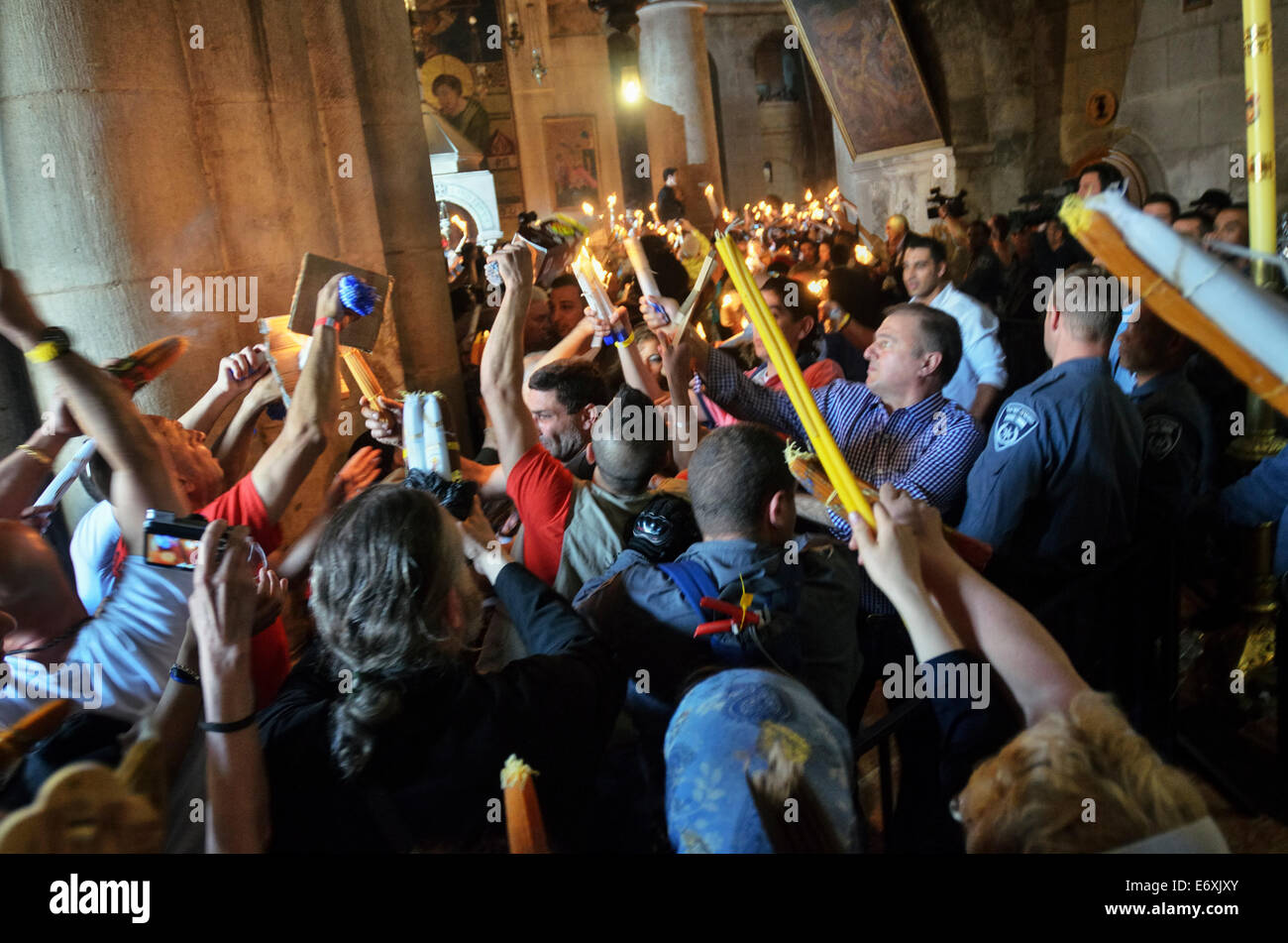 People celebrating Great Saturday inside the Church of the Holy ...