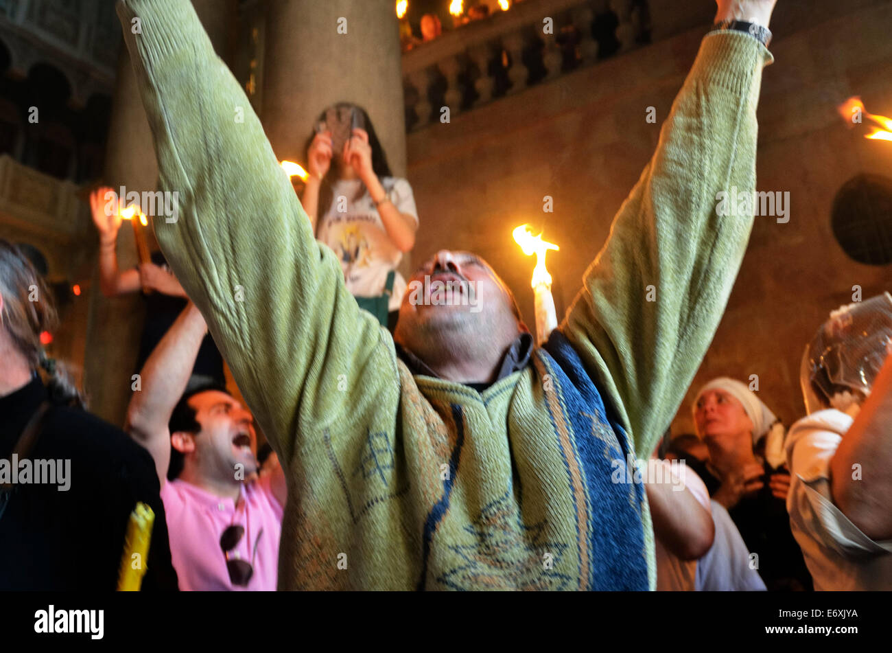 People celebrating Great Saturday inside the Church of the Holy ...