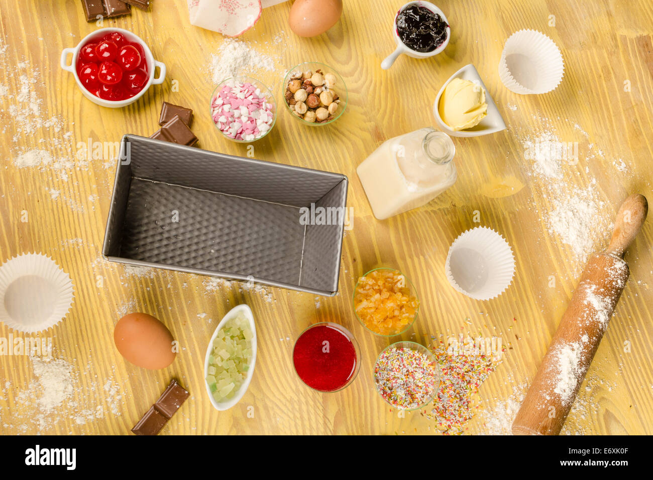 Messy table full of ingredients for homemade cupcakes Stock Photo - Alamy