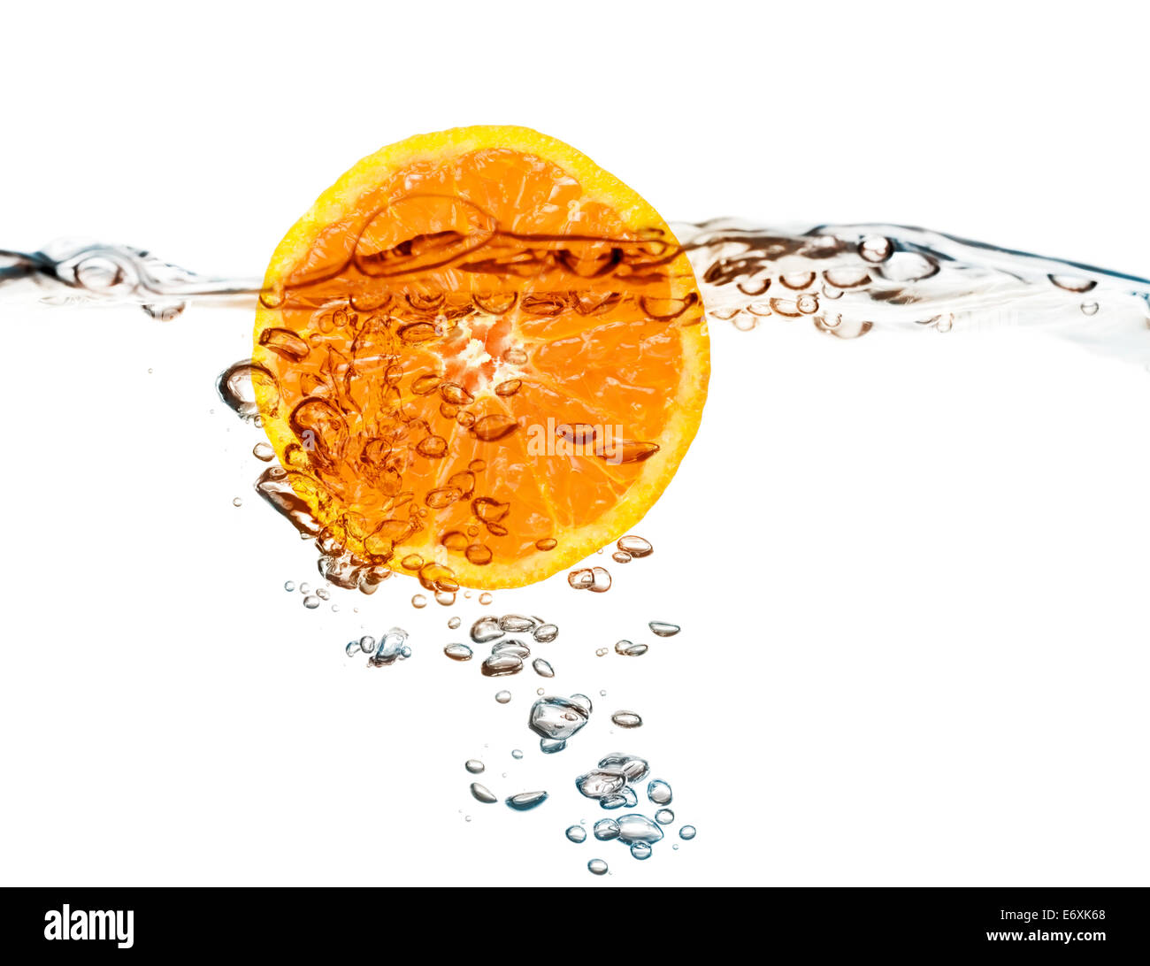 orange slice splash in transparent water, on white background Stock Photo - Alamy