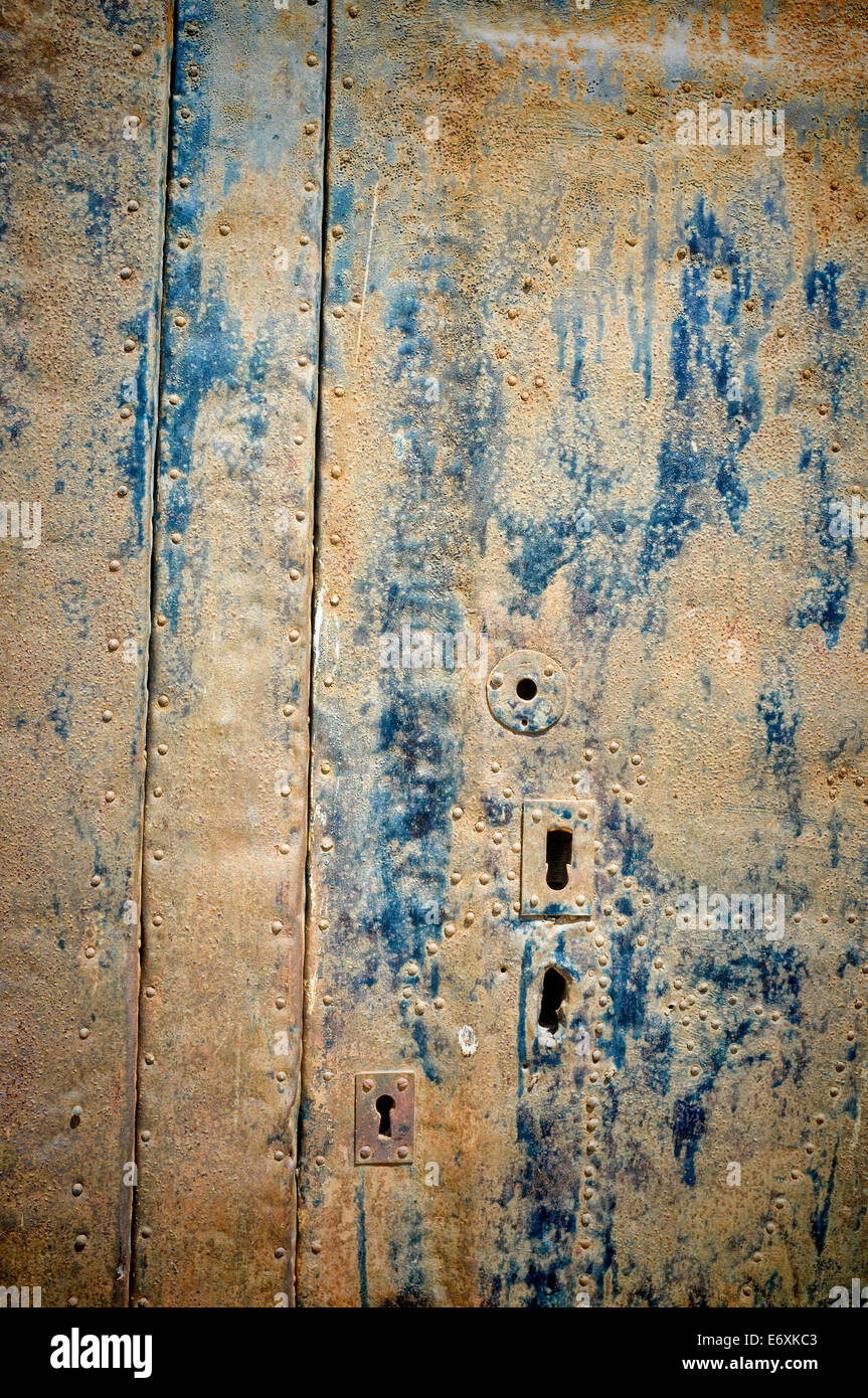 Full frame take of an aged blue metal plate with rivets Stock Photo - Alamy