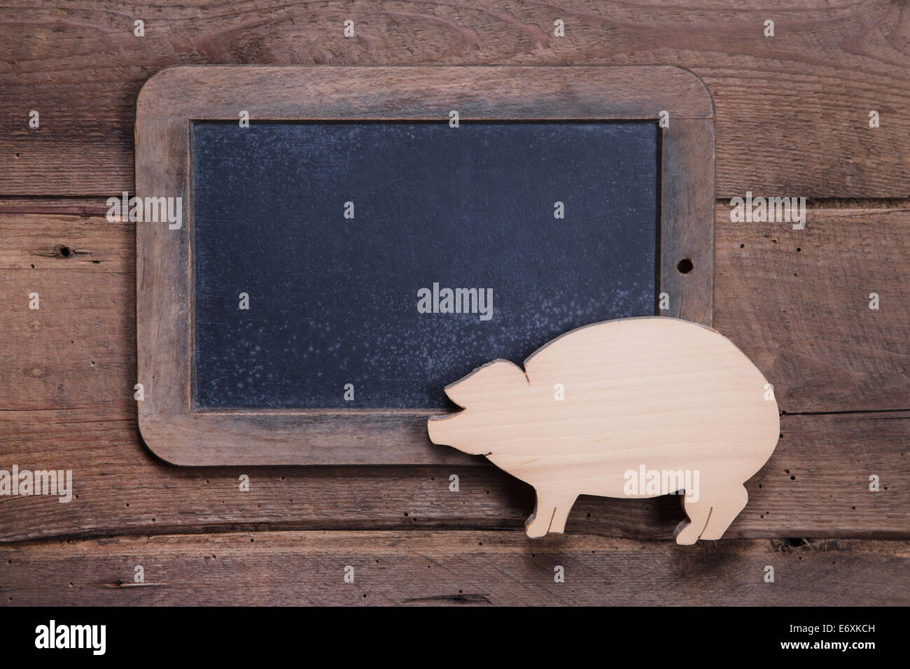 Menu board with pink pig on wooden background for New Year, sylvester ...
