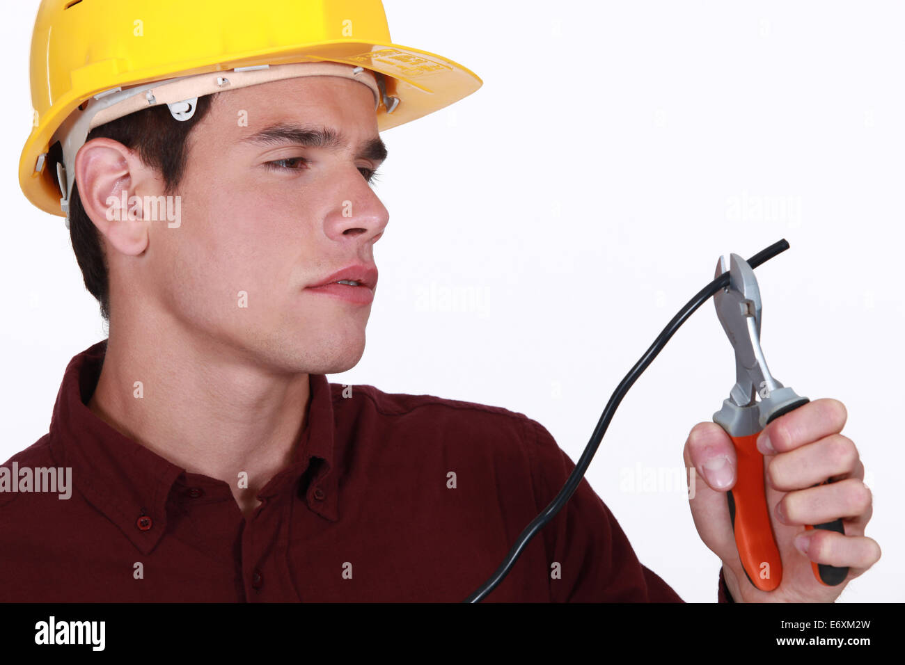 Electrician clipping wire Stock Photo - Alamy