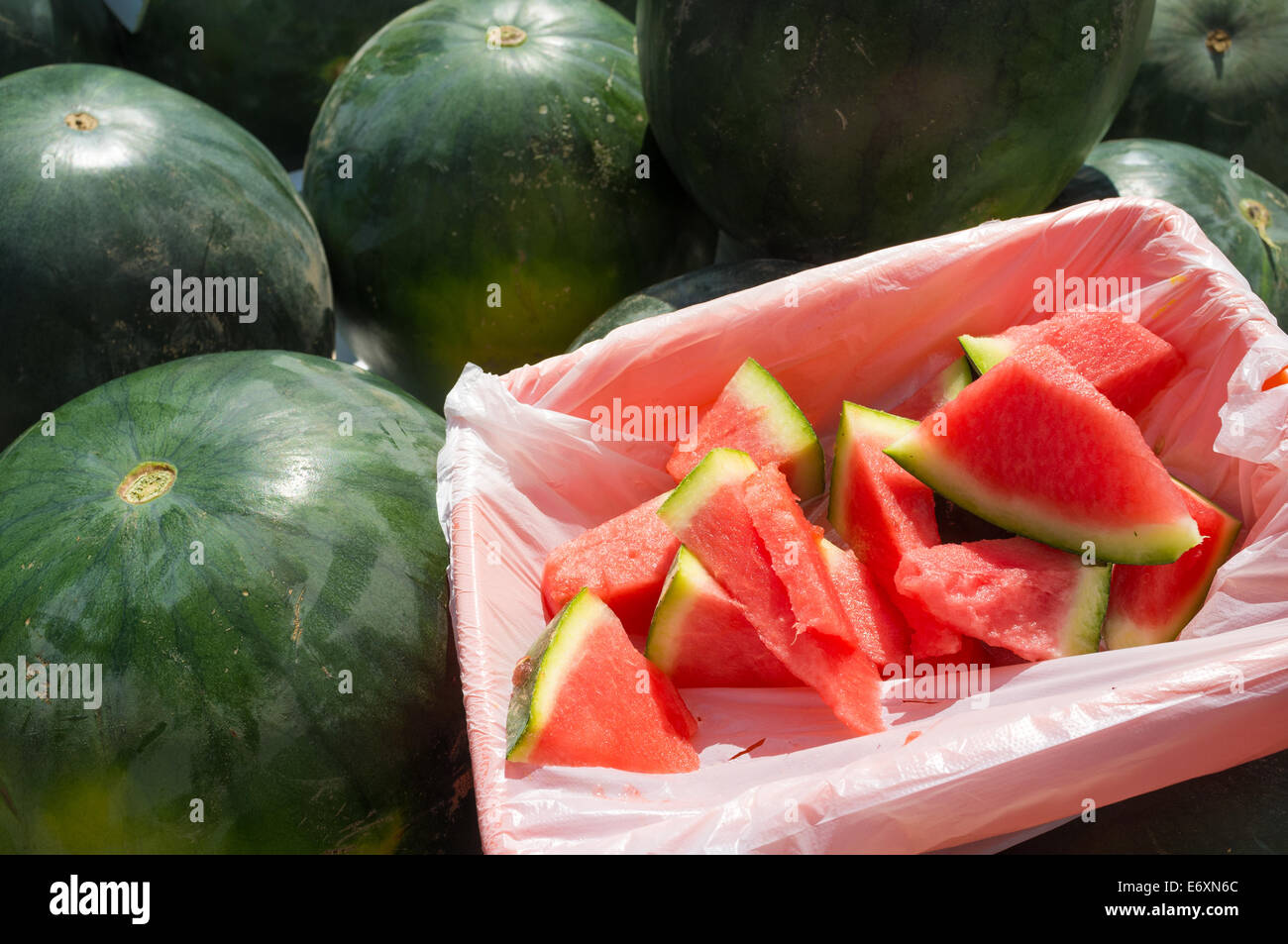 Full frame take of watermelons on display on a street market stall ...