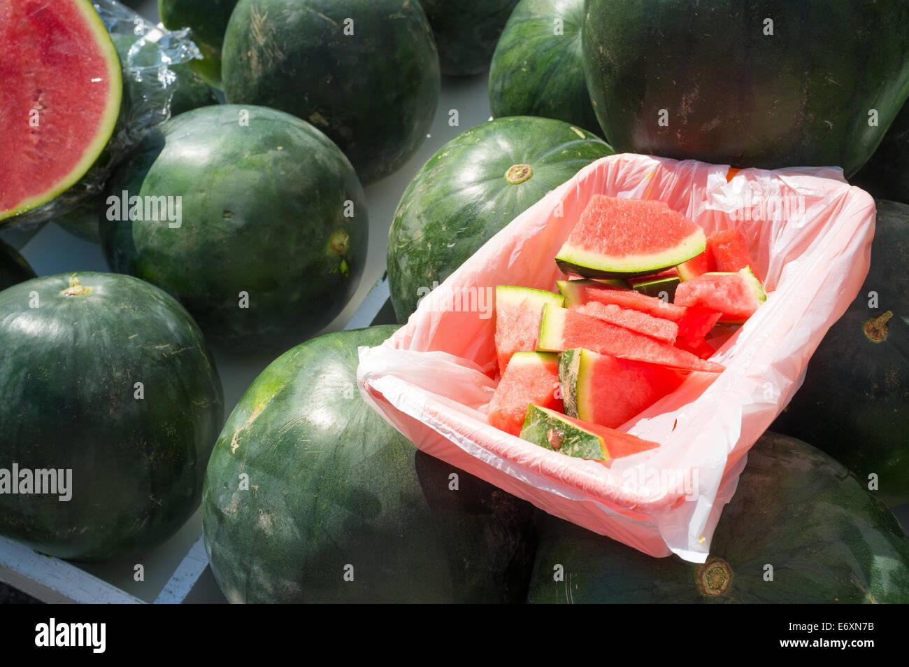 Full frame take of watermelons on display on a street market stall ...
