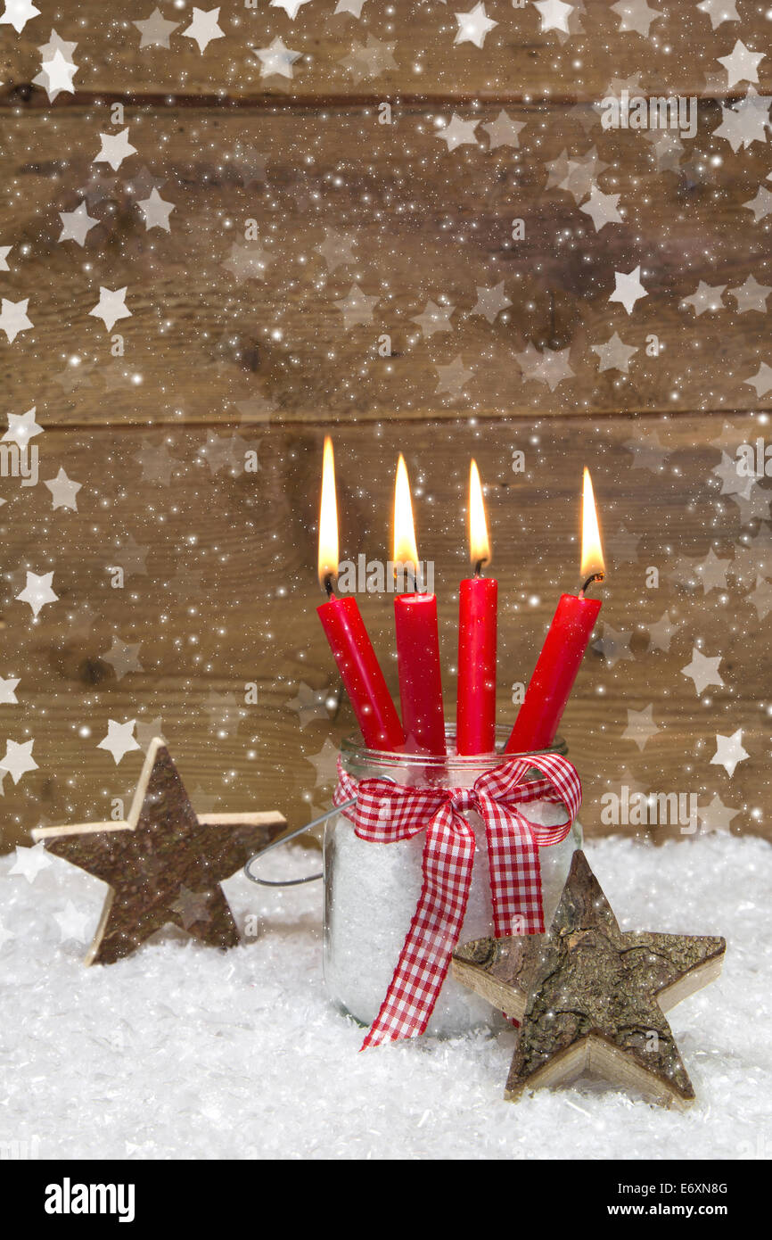 Vertical Christmas card with snowflakes wooden stars and four burning ...