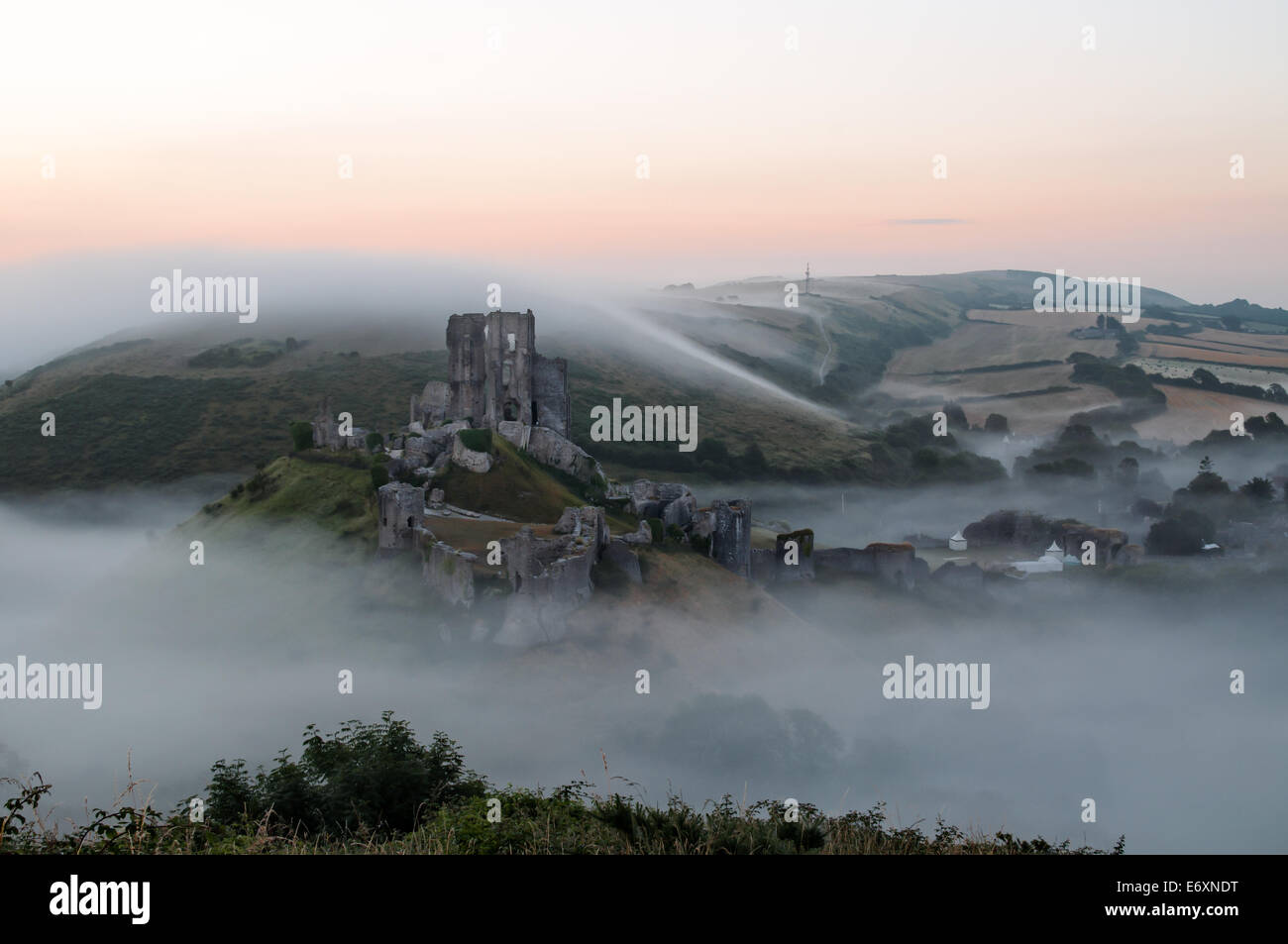 Corfe Castle in the mist Stock Photo - Alamy