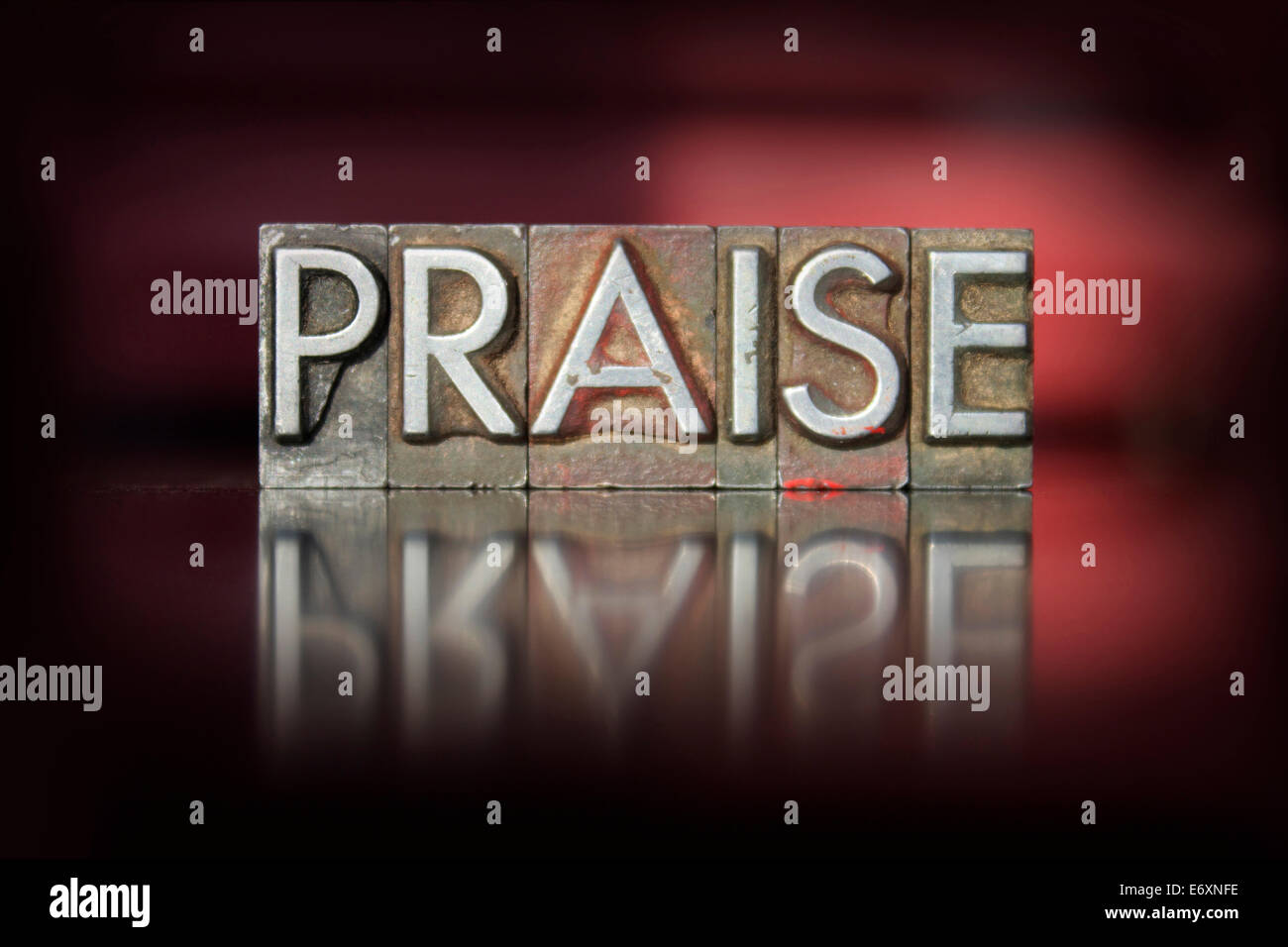 The word Praise written in vintage letterpress type Stock Photo - Alamy