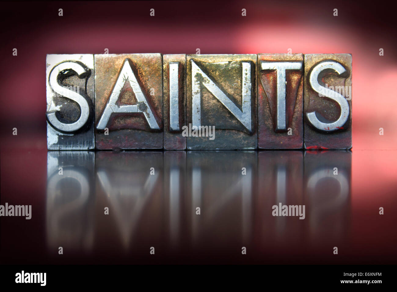 The word Saints written in vintage letterpress type Stock Photo - Alamy