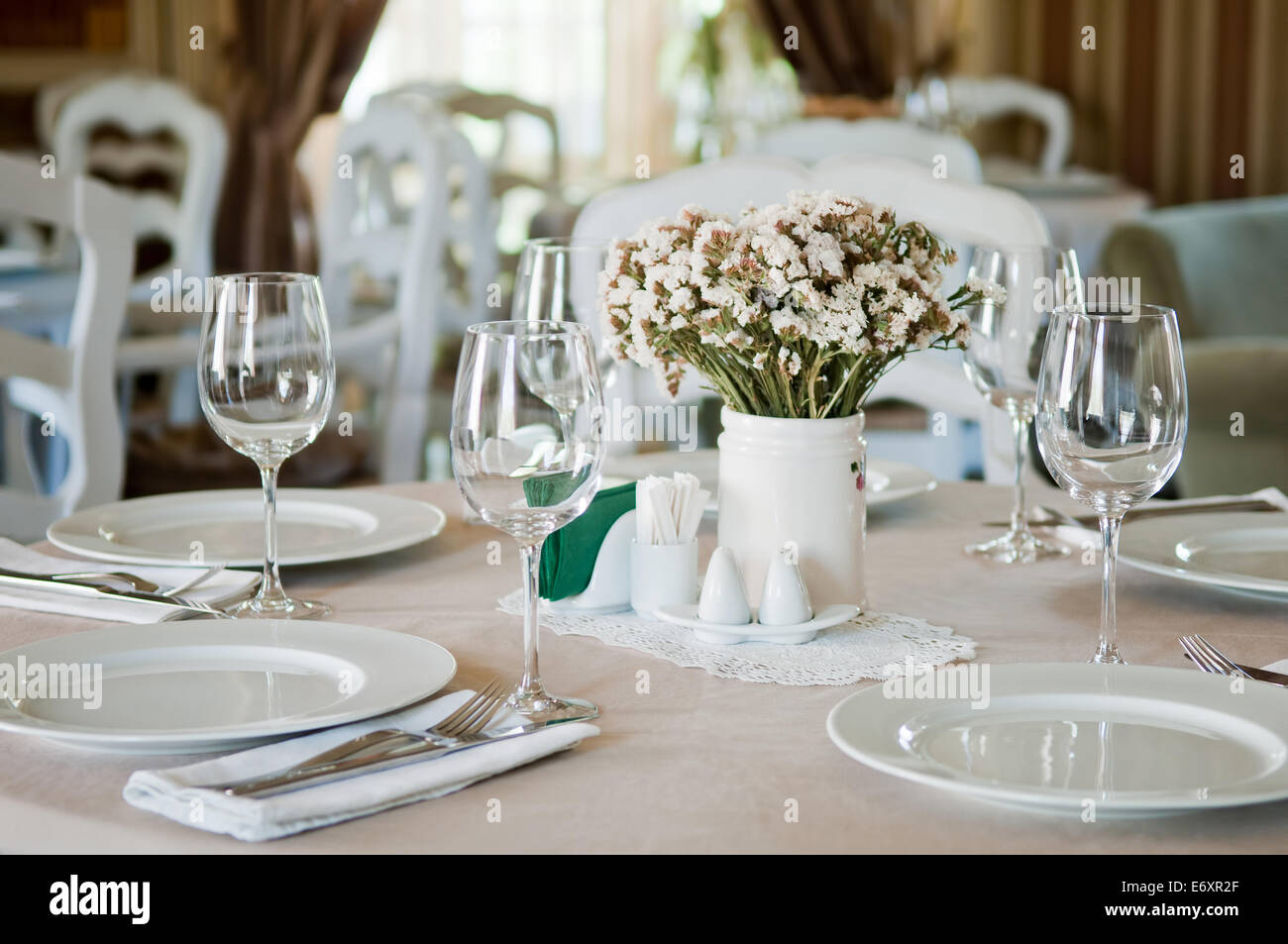 Fine table setting in beatiful gourmet restaurant Stock Photo - Alamy
