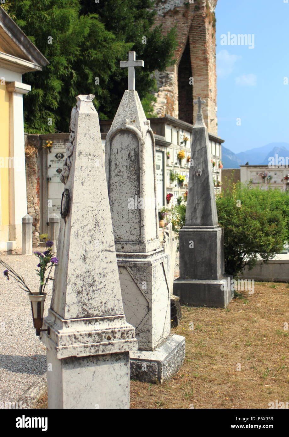 Tombstones at cemetery for urns in italian village Stock Photo - Alamy