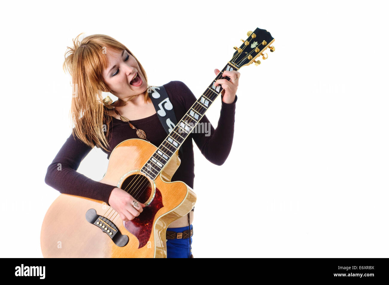 Rocker with his classic acoustic guitar Stock Photo - Alamy
