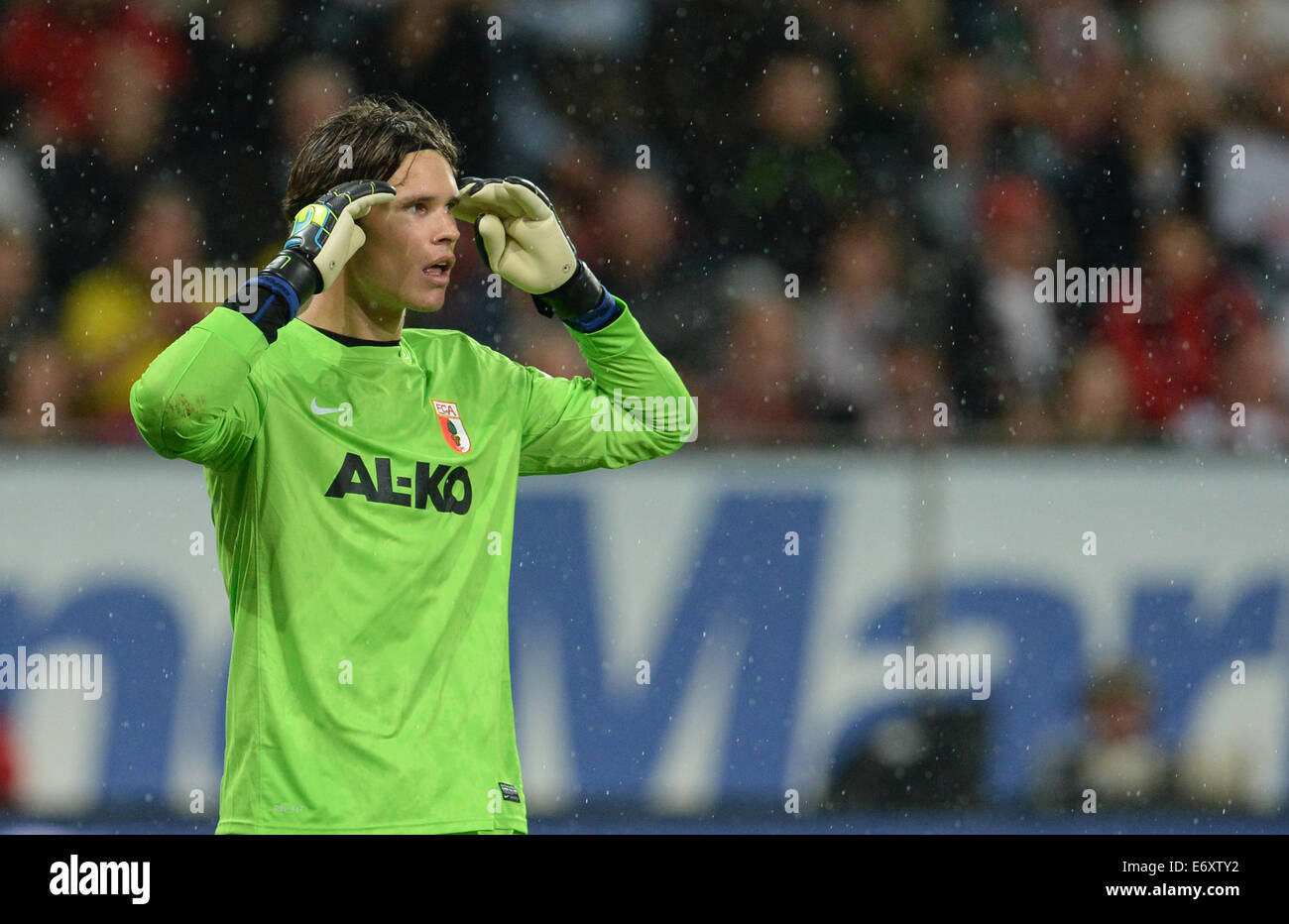 Augsburg, Germany. 29th Aug, 2014. Augsburg's goalkeeper Marwin Hitz ...