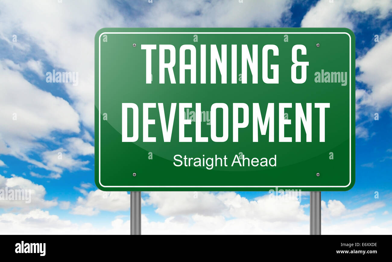Training and Development on Highway Signpost Stock Photo - Alamy